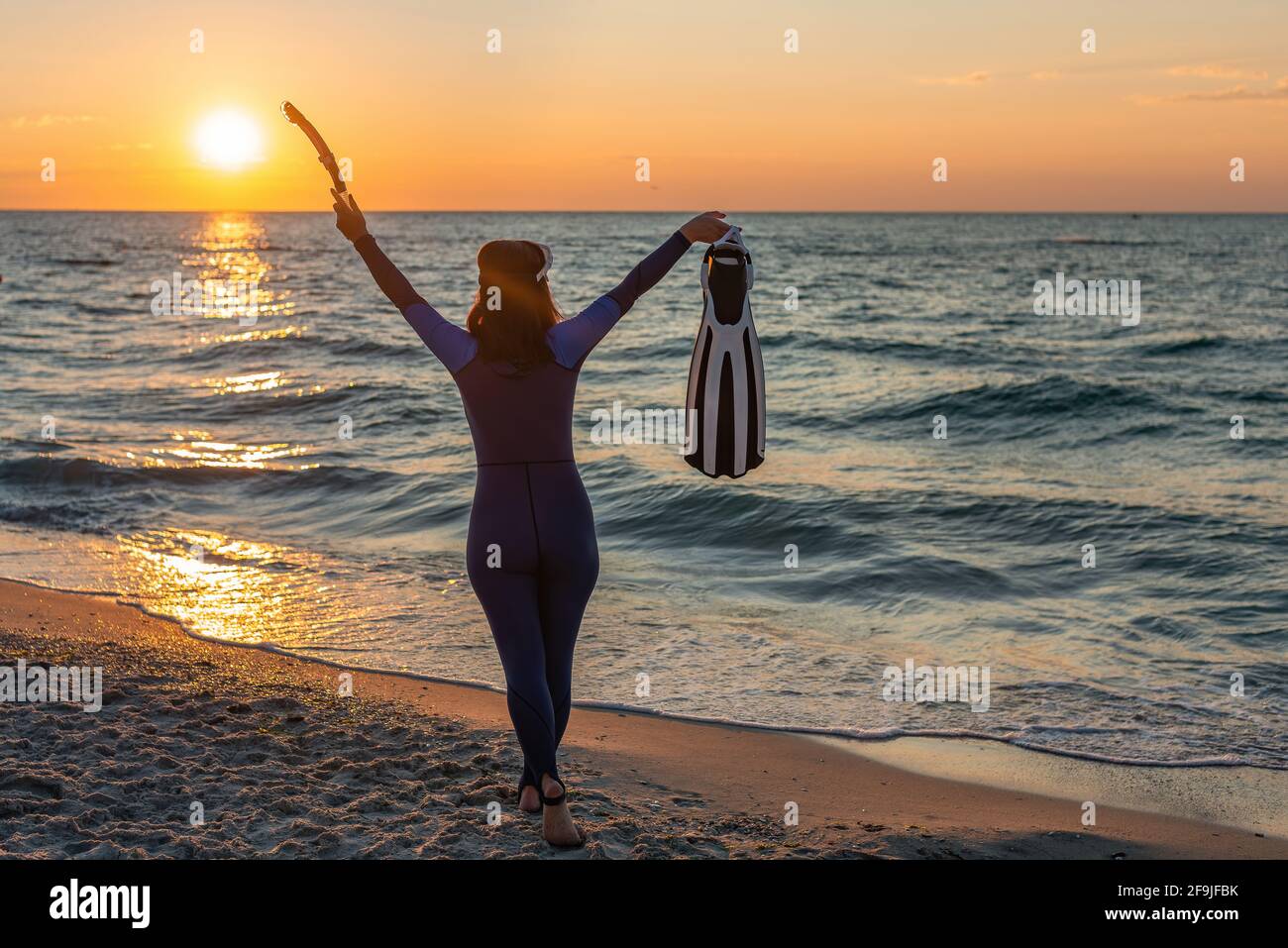 Woman diver standing hi-res stock photography and images - Alamy