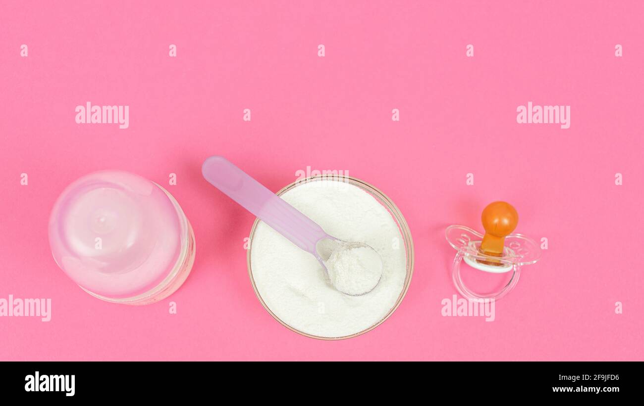 Powdered Milk, Baby Formula with spoon. Infant formula in bowl and ...