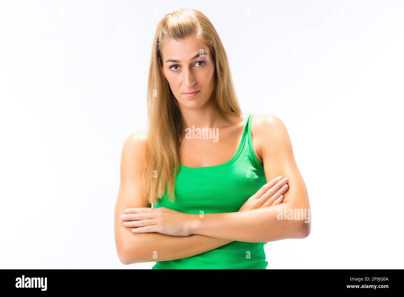Close-up of an angry young woman with her arms crossed Stock Photo - Alamy