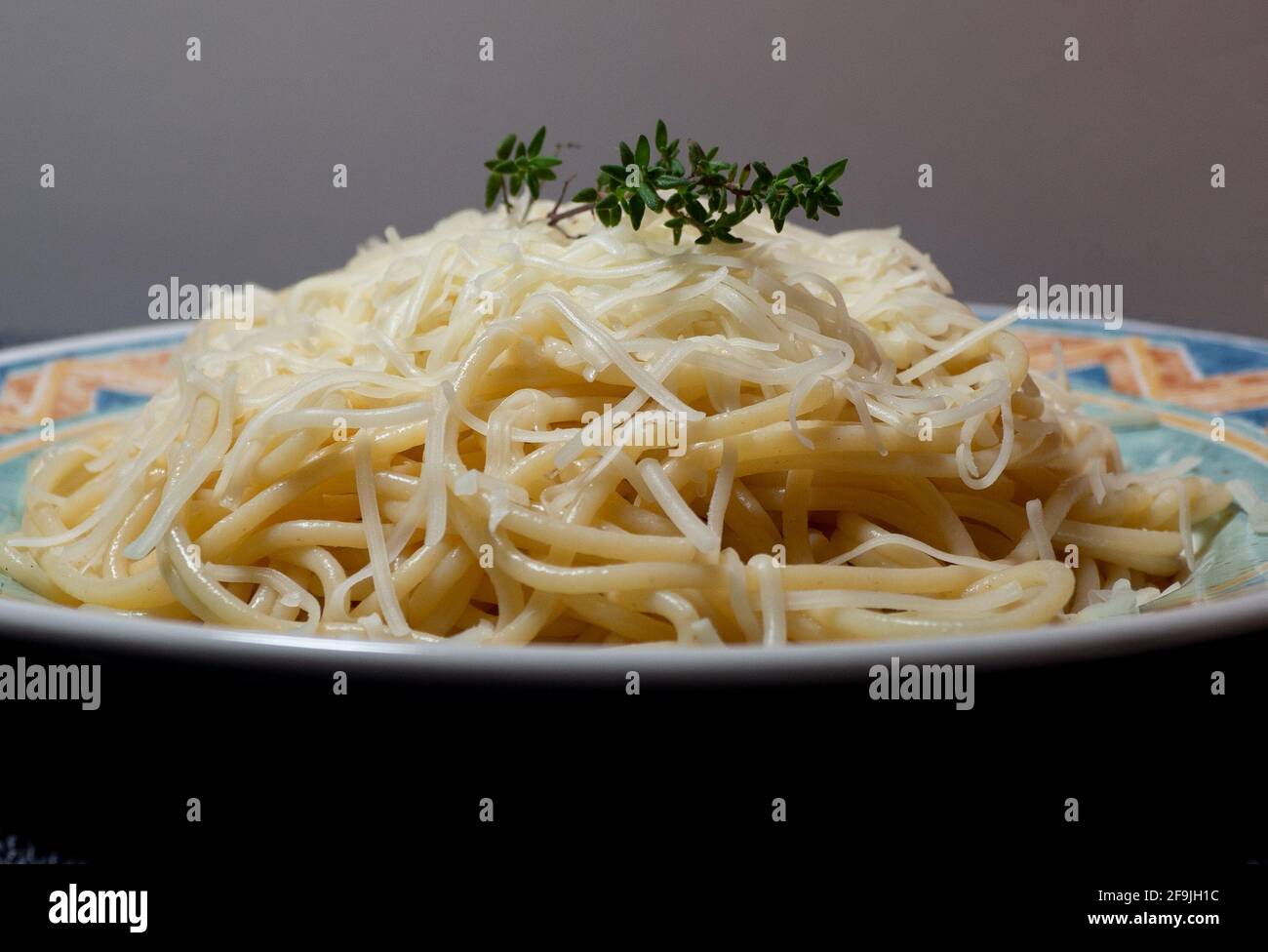 Plate of spaghetti with cheese Stock Photo - Alamy