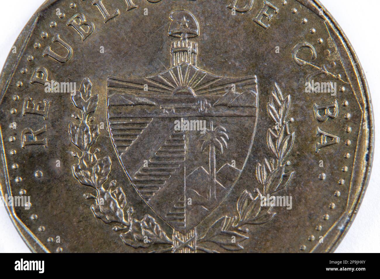 Cuban coat of arms in a one peso coin, Cuba Stock Photo - Alamy