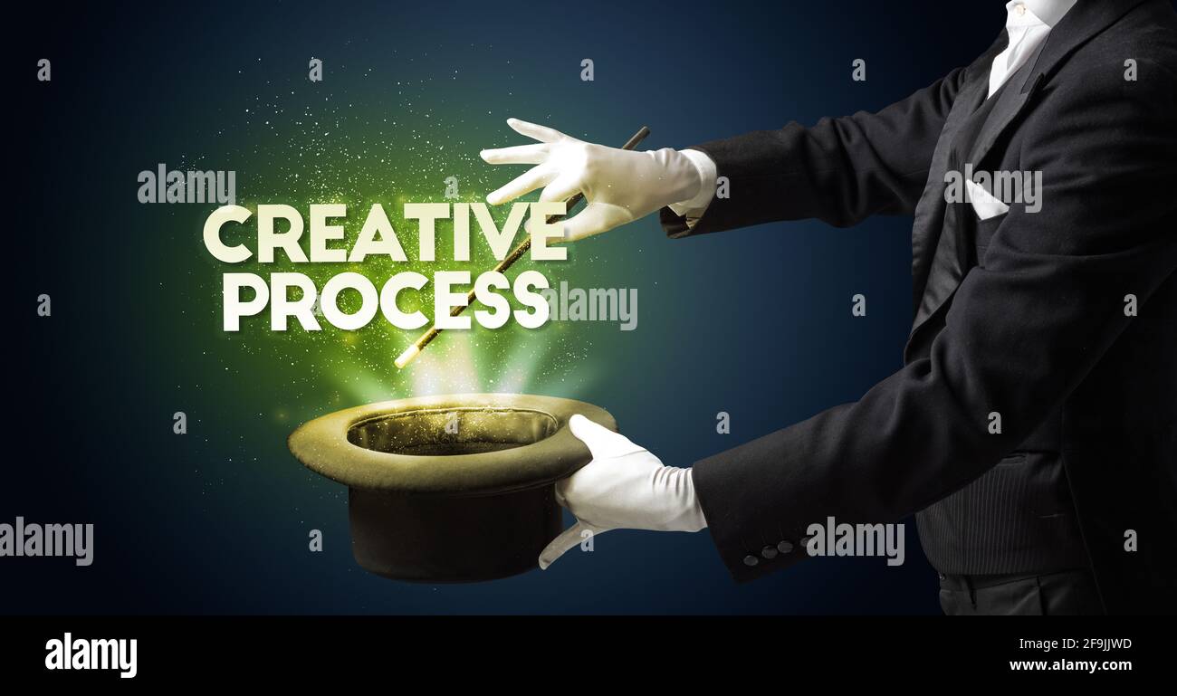 Magician is showing magic trick Stock Photo - Alamy