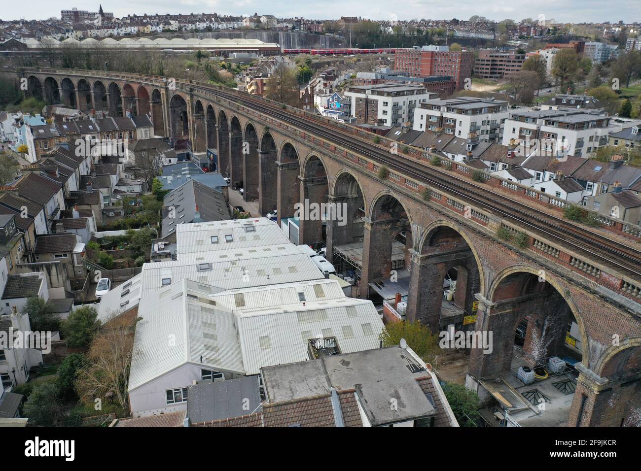 Aerial view of Preston area of Brighton with Viaduct leading to train ...