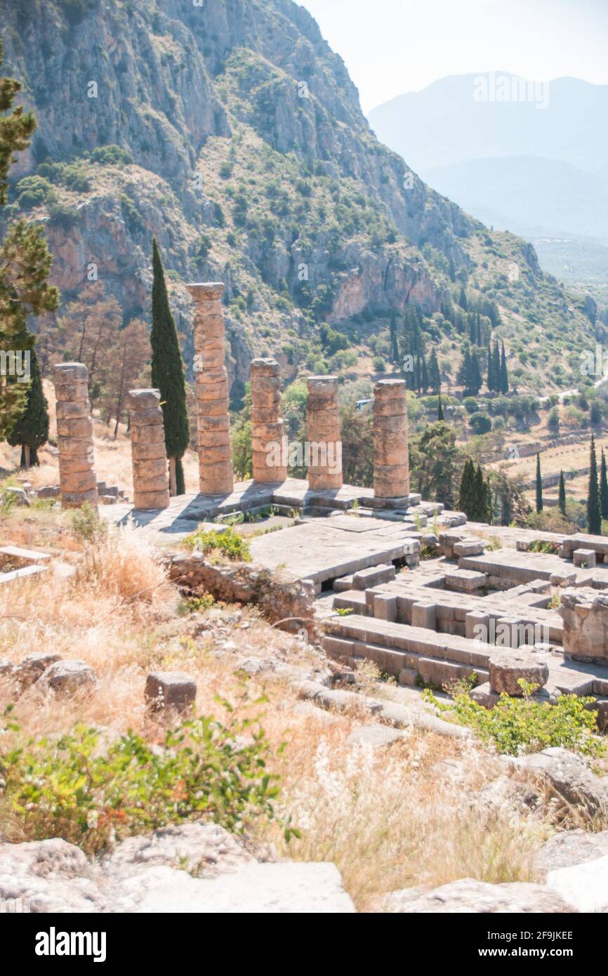 Ancient columns of the Temple of Apollo at Delphi, Greece Stock Photo ...