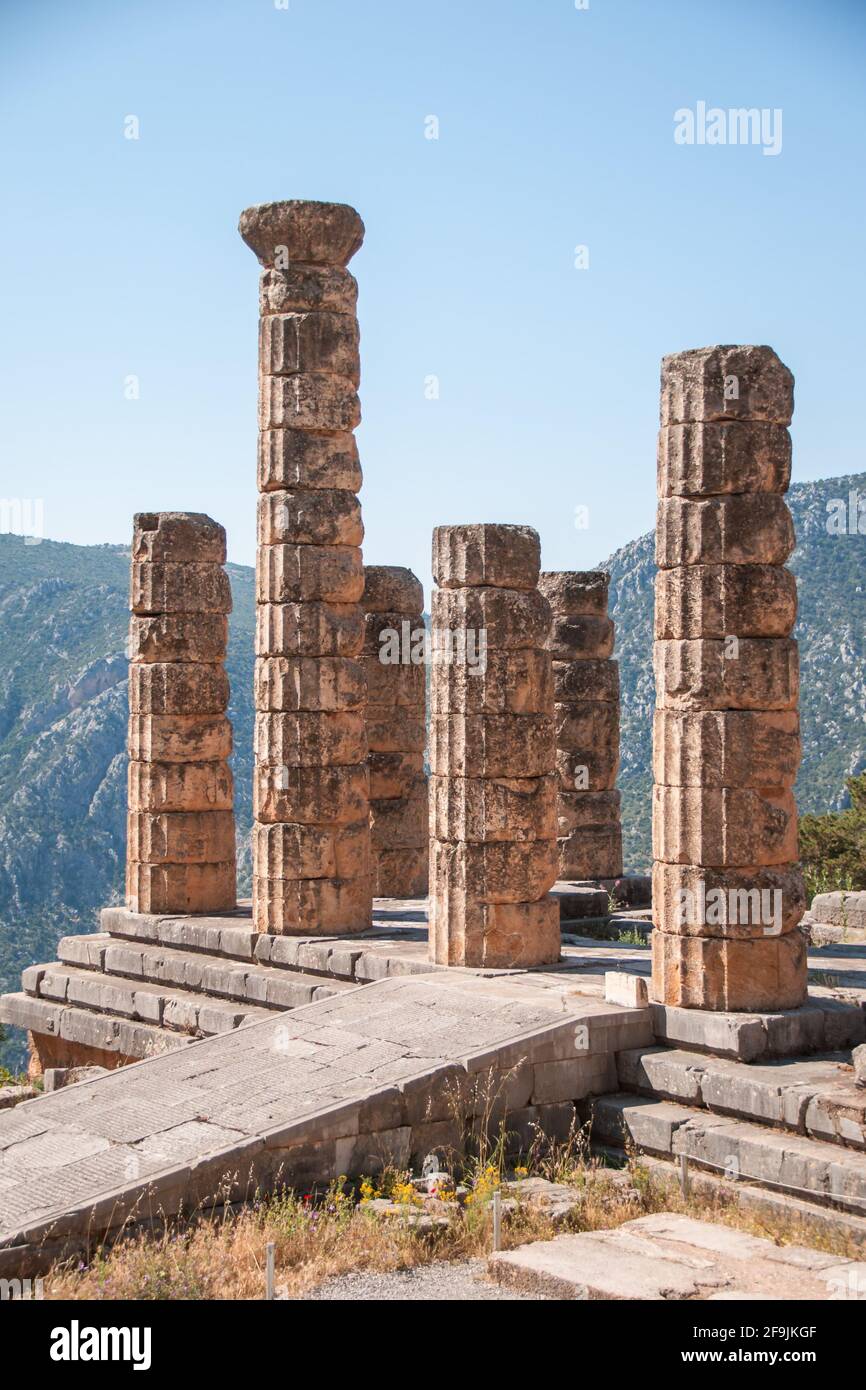 Ancient columns of the Temple of Apollo at Delphi, Greece Stock Photo ...