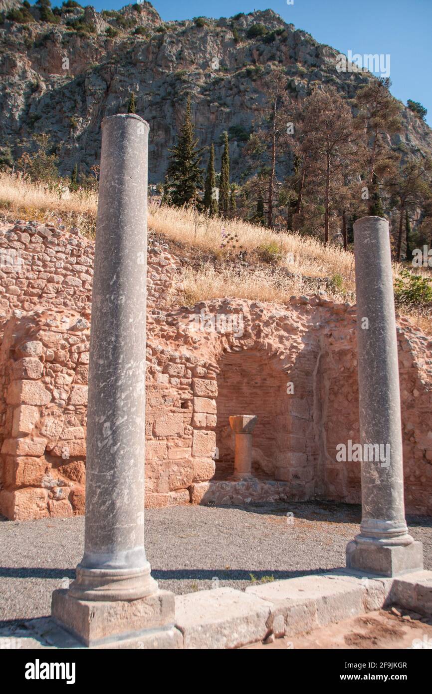 Ancient columns of the Temple of Apollo at Delphi, Greece Stock Photo ...