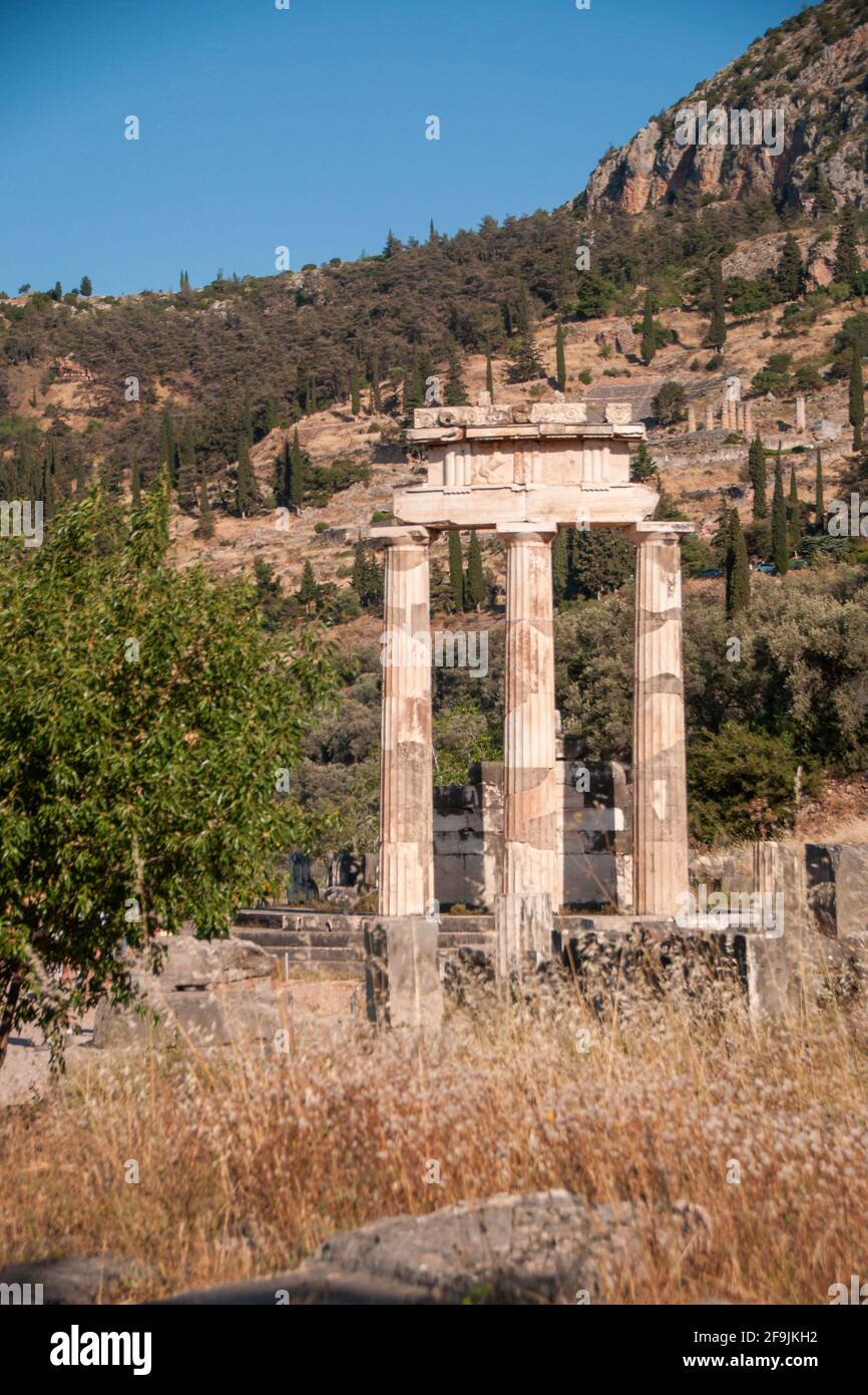 Ancient columns of the Temple of Apollo at Delphi, Greece Stock Photo ...