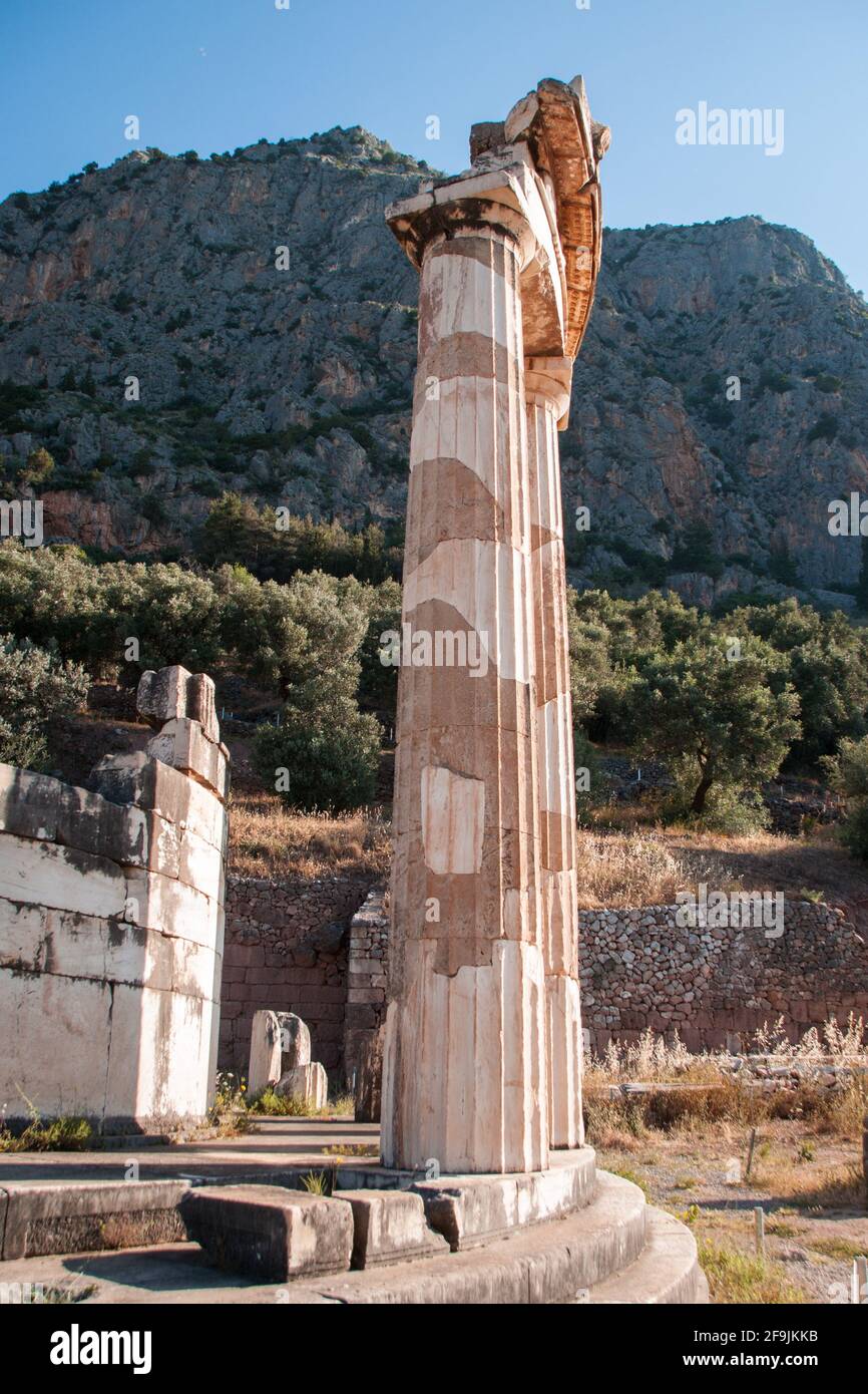 Ancient columns of the Temple of Apollo at Delphi, Greece Stock Photo ...