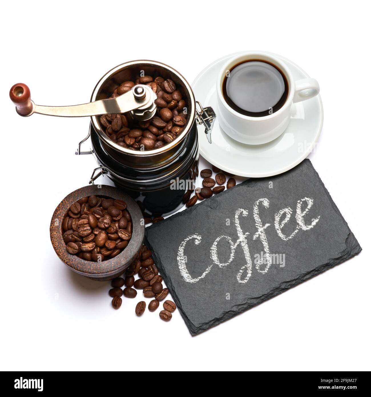 Coffee handwritten inscription sign on chalk board, coffee grinder and ...