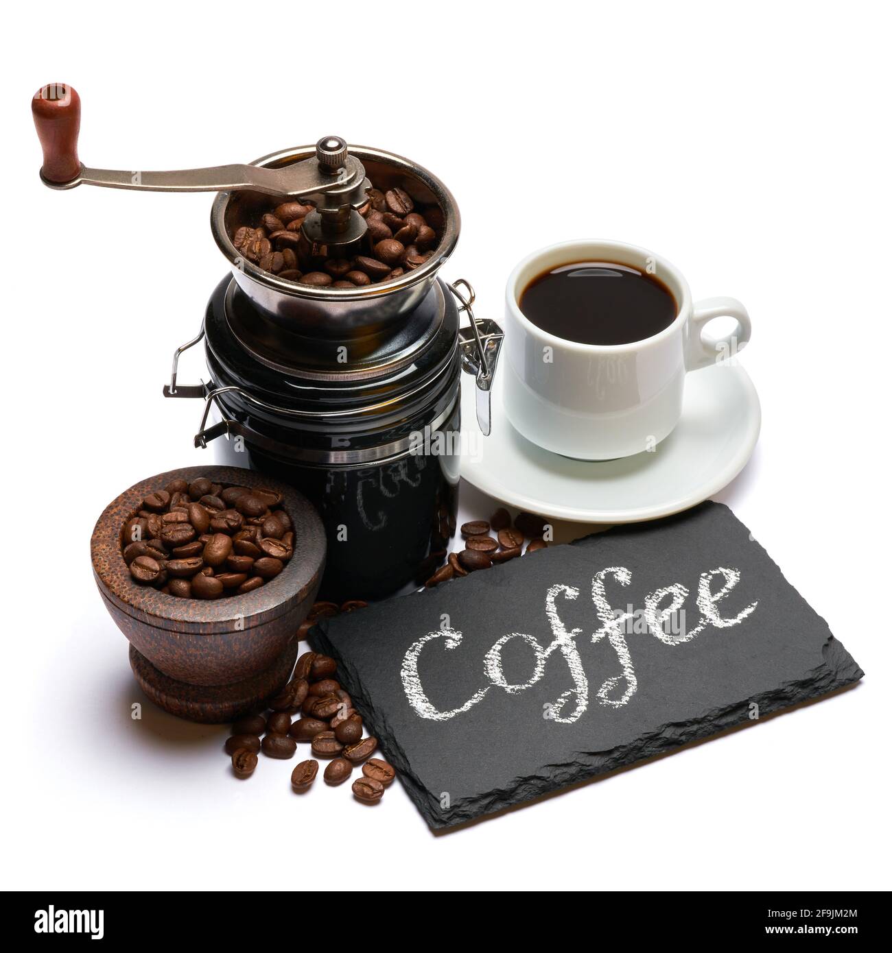 Coffee handwritten inscription sign on chalk board, coffee grinder and ...