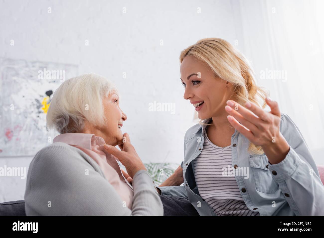Adult mother and daughter talk home hi-res stock photography and images ...