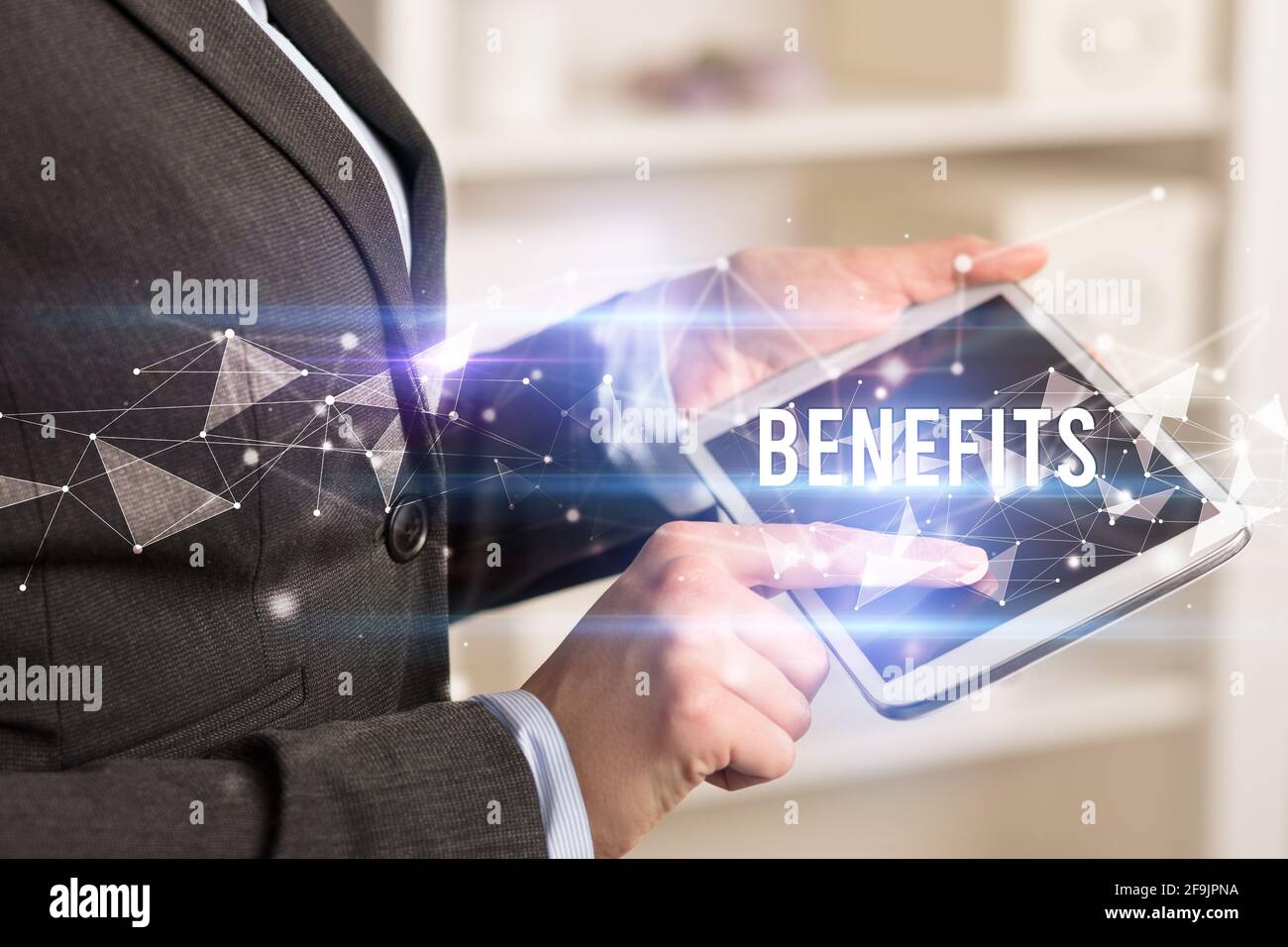 Close up hands using tablet Stock Photo - Alamy