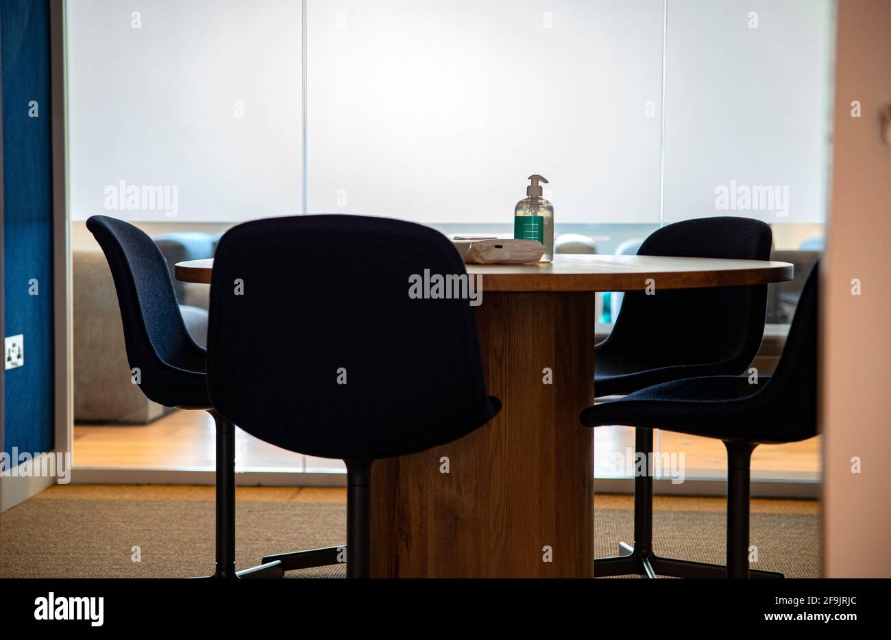 Office in times of covid - hand sanitizer and tissues at the meeting ...