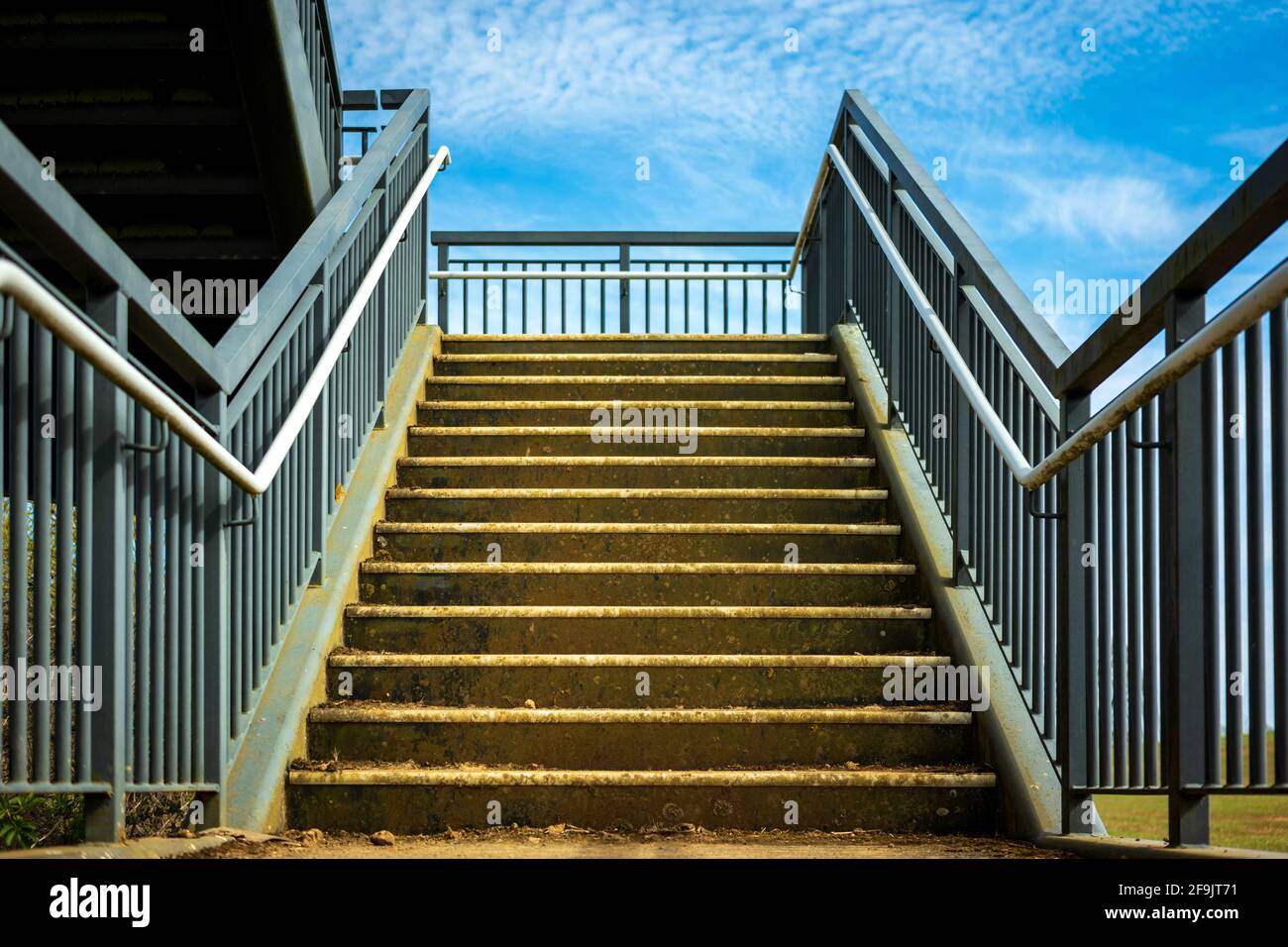 pedestrian metal bridge elevated walkway over british railroad in ...