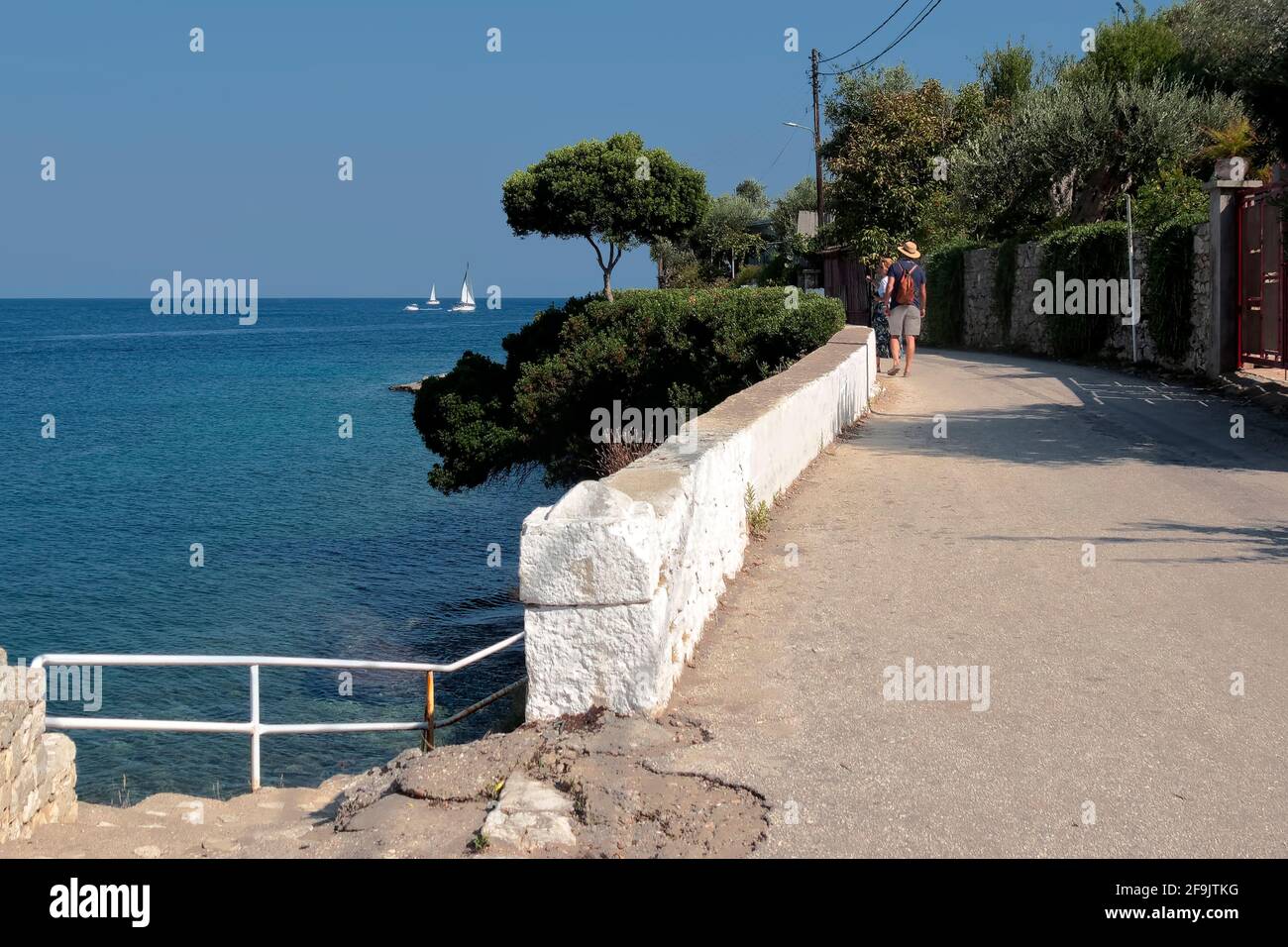 Walking sea promenade greece hi-res stock photography and images - Alamy