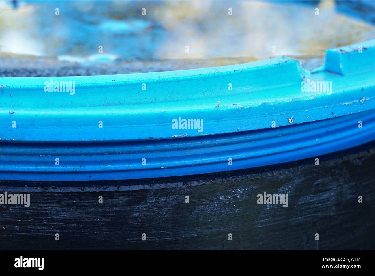 Blue lid of a barrel Stock Photo - Alamy