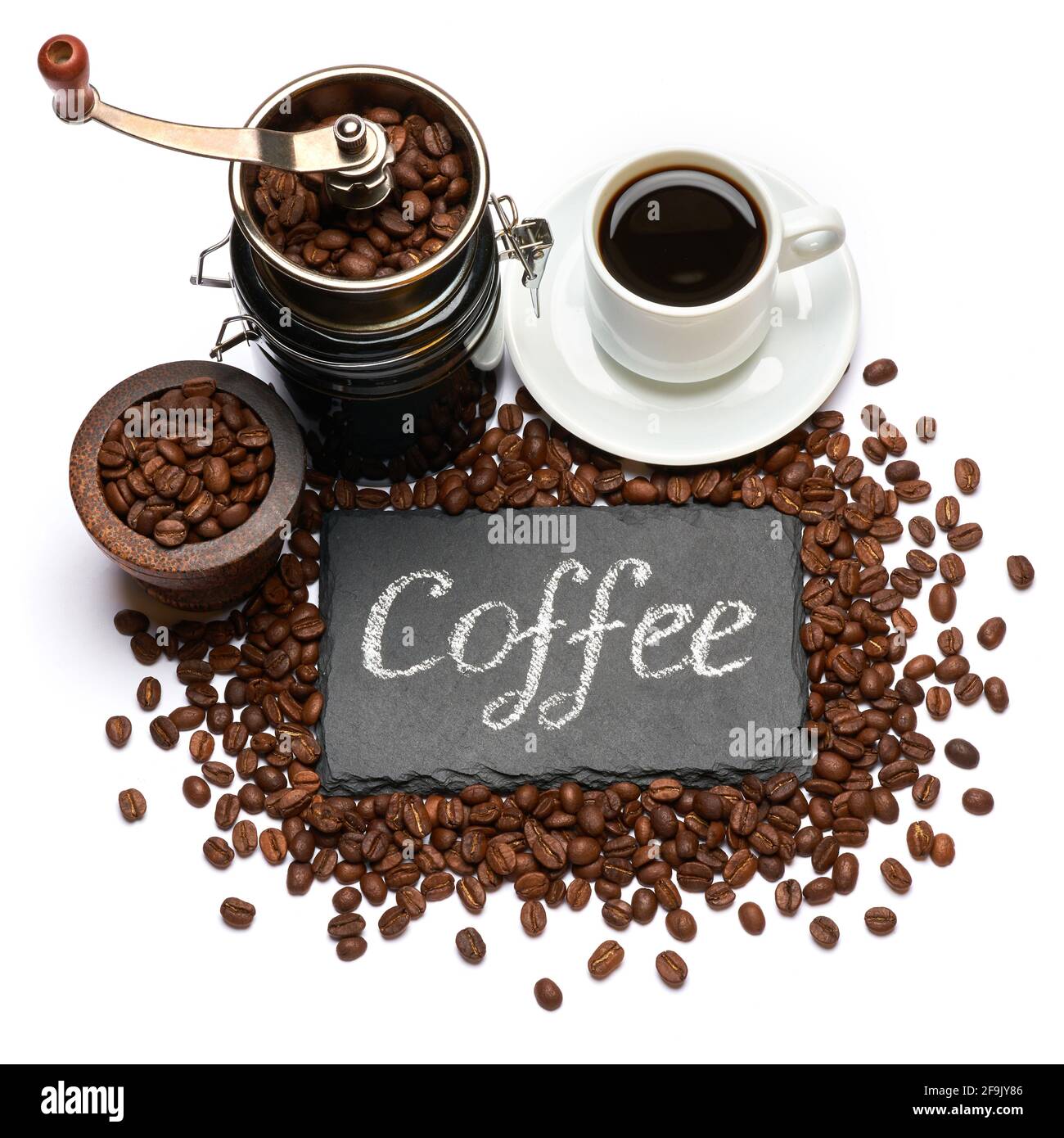 Coffee handwritten inscription sign on chalk board, coffee grinder and ...