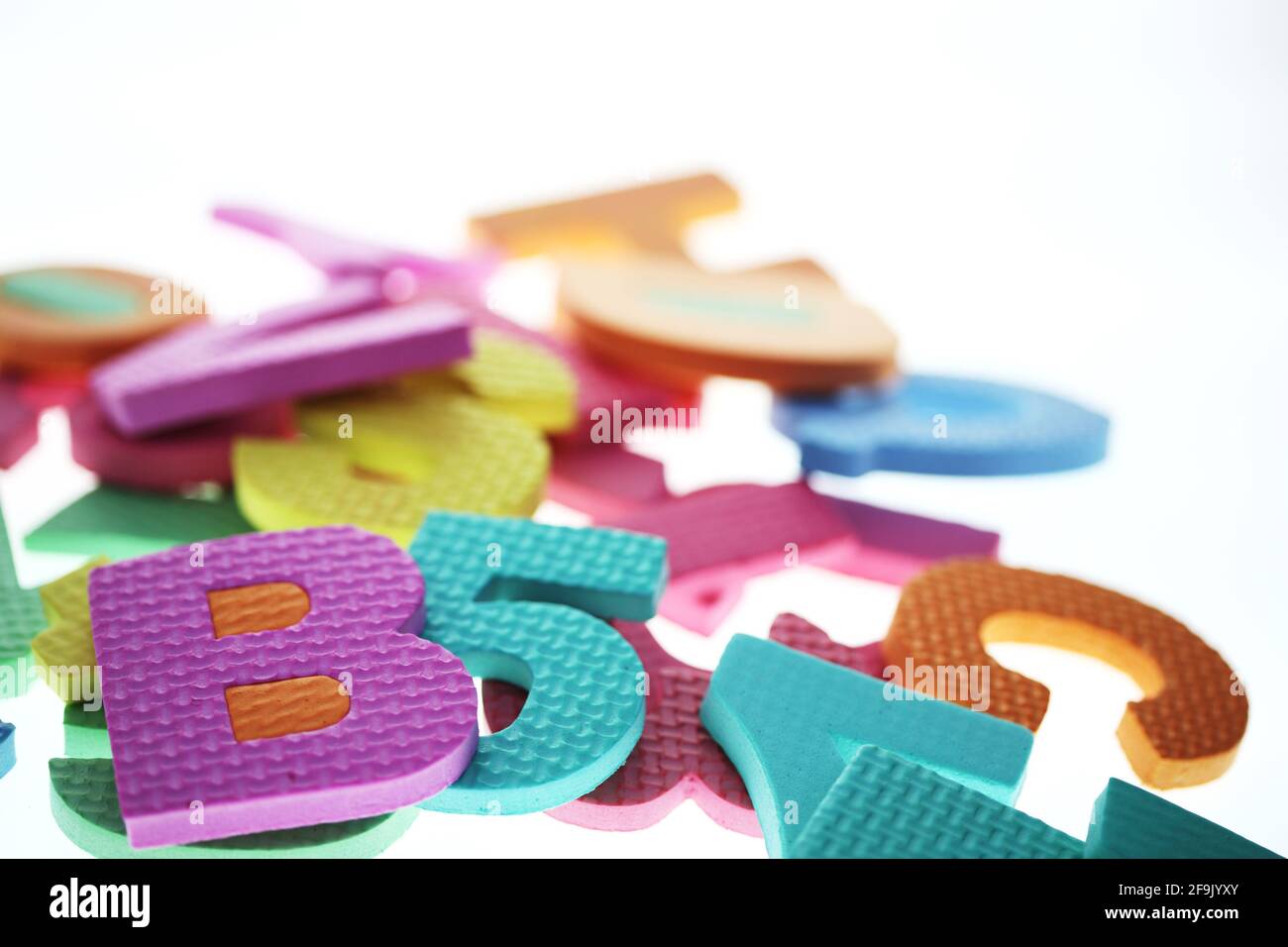 Random alphabetical puzzle pieces Stock Photo - Alamy