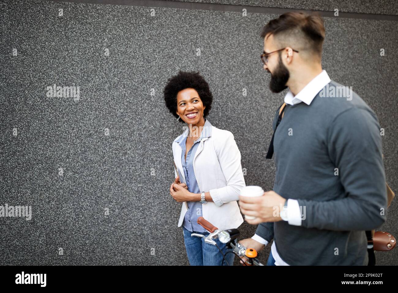 Happy business people, students having fun, smiling, talking in the ...