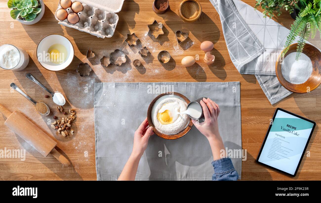 Top view of unrecognizable woman baking biscuits, desktop concept Stock ...