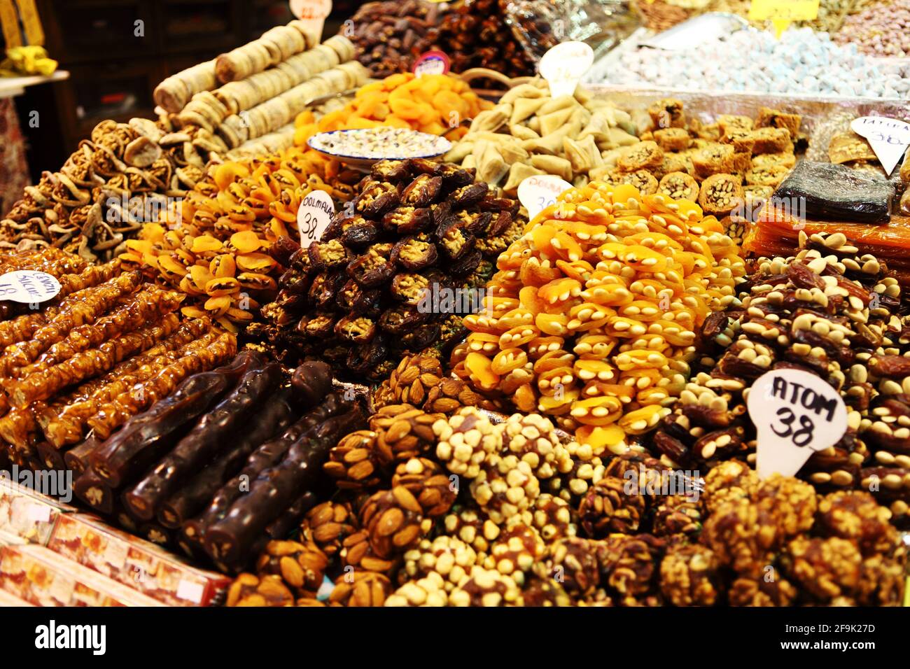 Variety of dry fruits including apricot, fig, nuts and Granola other ...