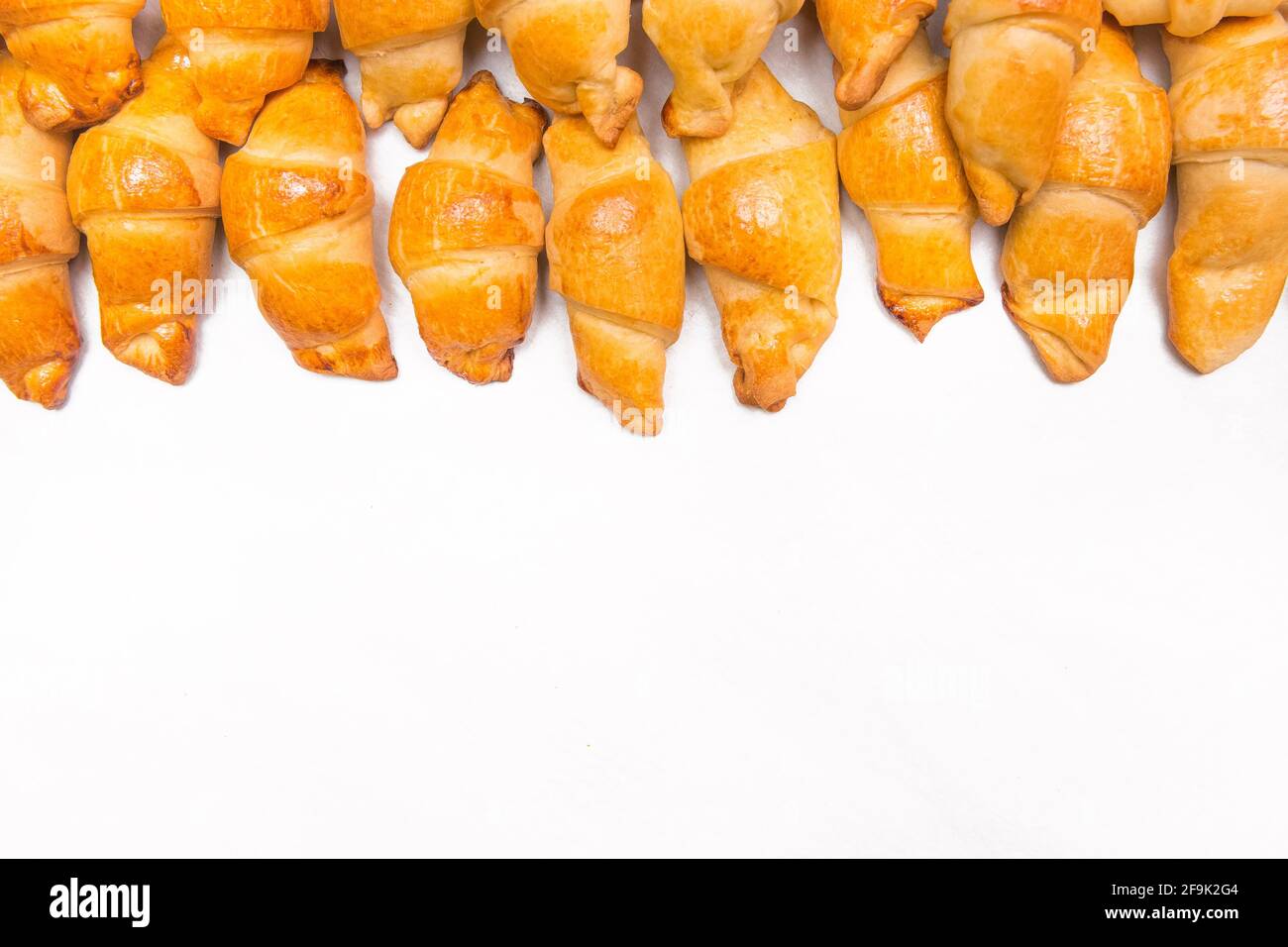Fresh homemade cakes. Buns. Croissants isolated on white background ...
