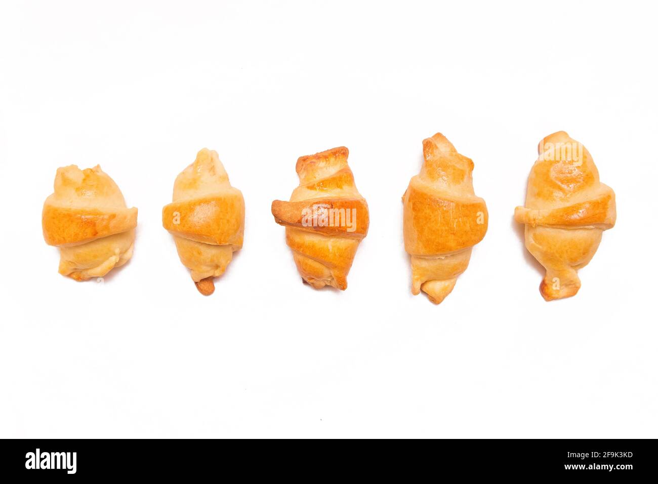 Fresh homemade cakes. Buns. Croissants isolated on white background ...