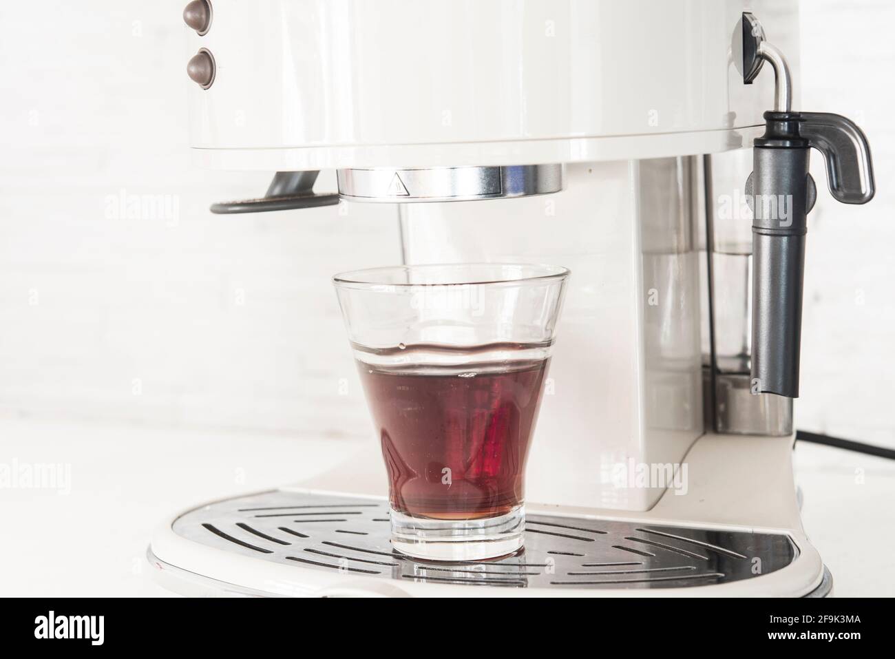 coffee maker in white background close up Stock Photo - Alamy