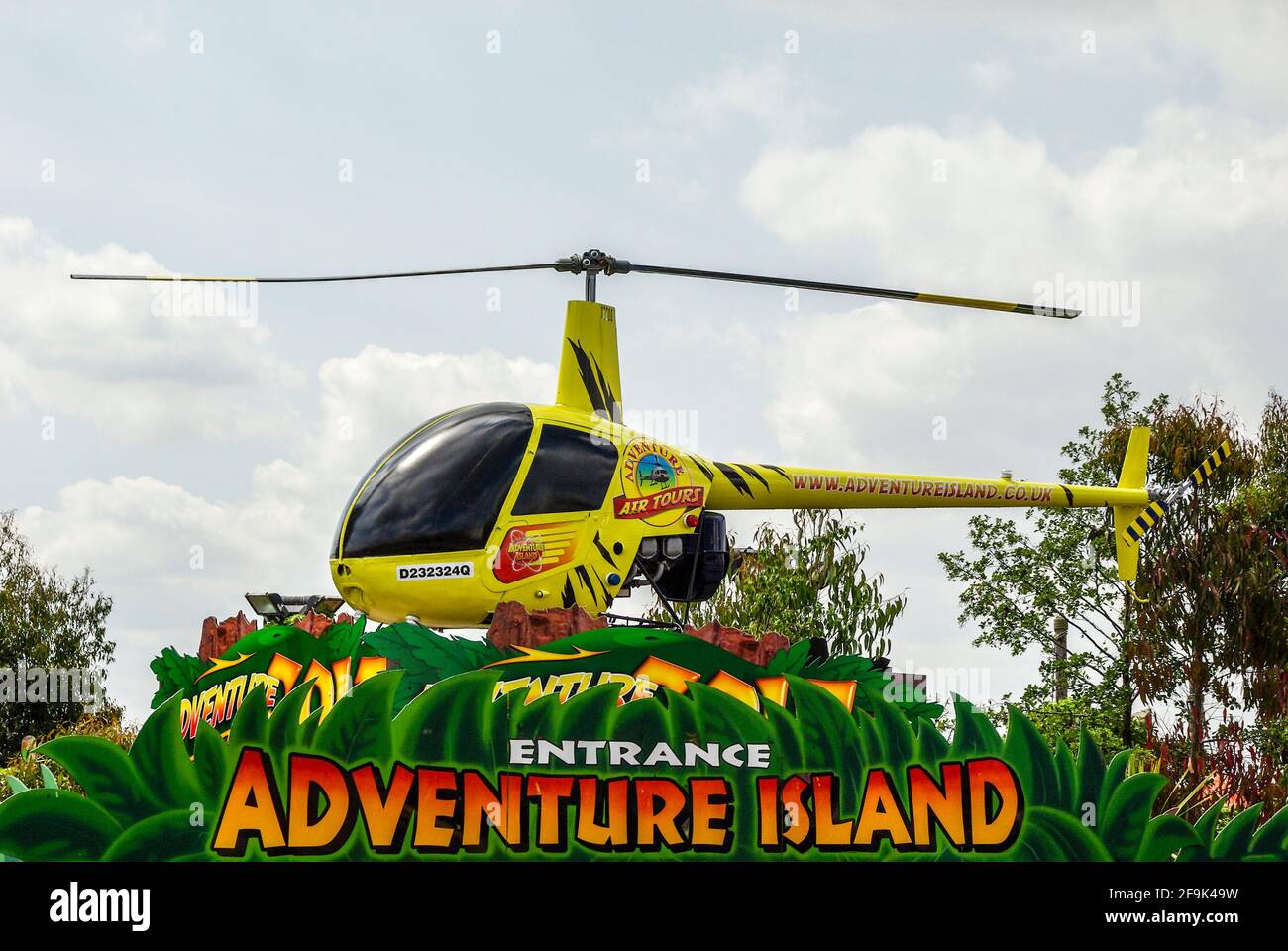 Robinson R22 helicopter over entrance to Adventure Island amusement ...