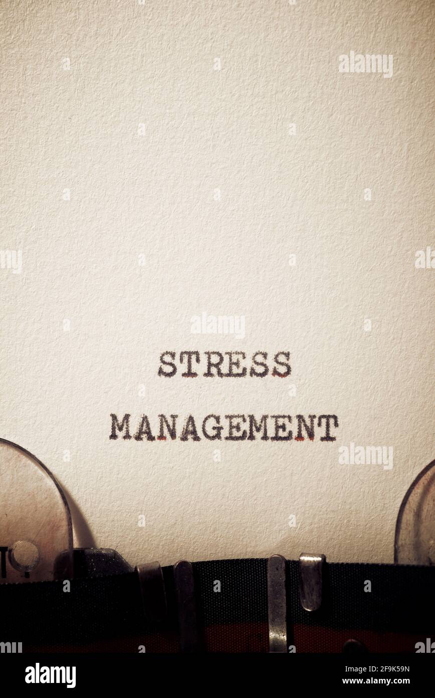 Stress management phrase written with a typewriter Stock Photo - Alamy