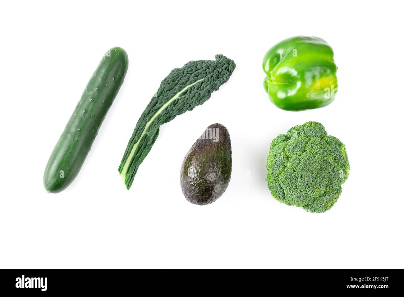 Layout made of green vegetables and fruits, kale, broccoli, bell pepper ...