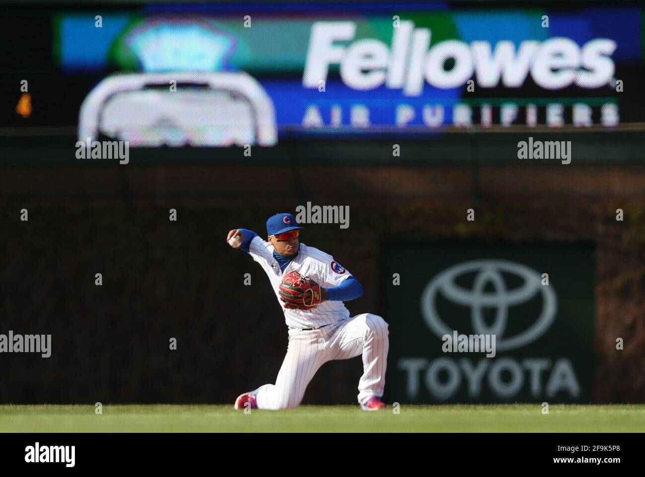 Chicago Cubs shortstop Javier Baez fields a ball for an out in the ...