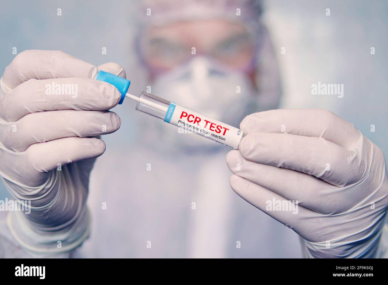 PCR TEST. Healthcare professional holding Coronavirus COVID19 test kit ...