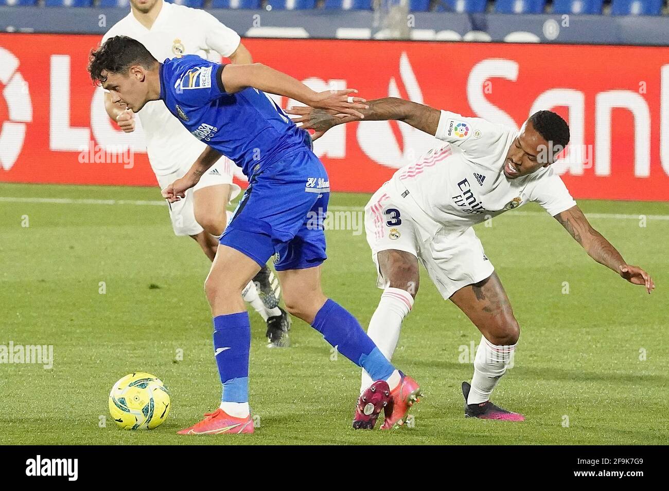 Getafe CF's Enes Unal (l) and Real Madrid's Eder Militao during La Liga ...