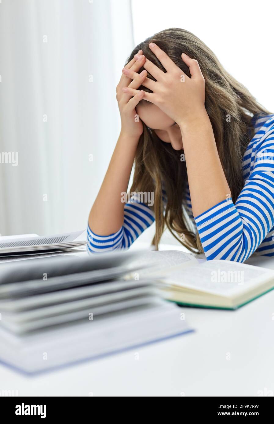 stressed student girl with books learning at home Stock Photo - Alamy