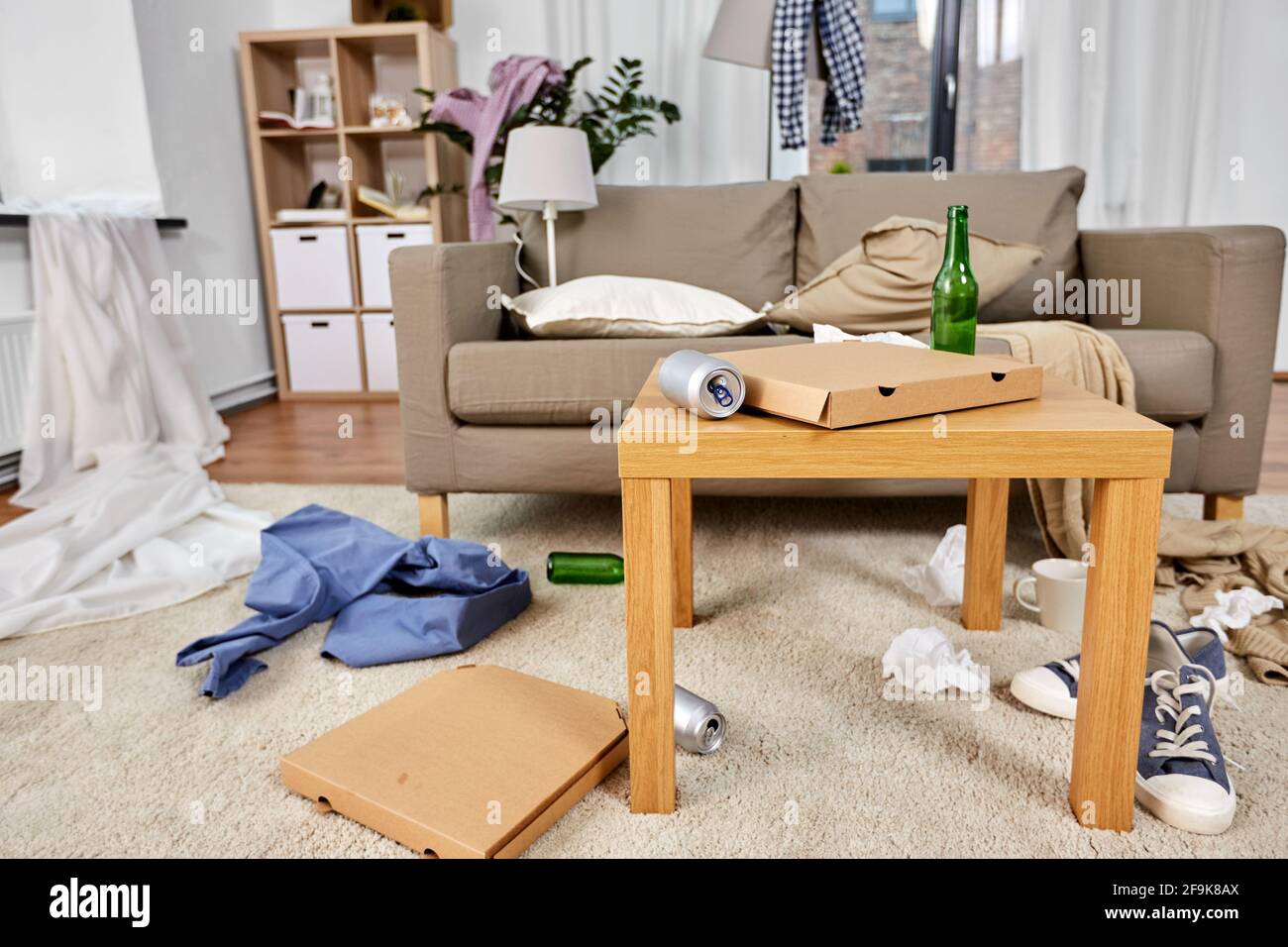 messy home living room with scattered stuff Stock Photo - Alamy