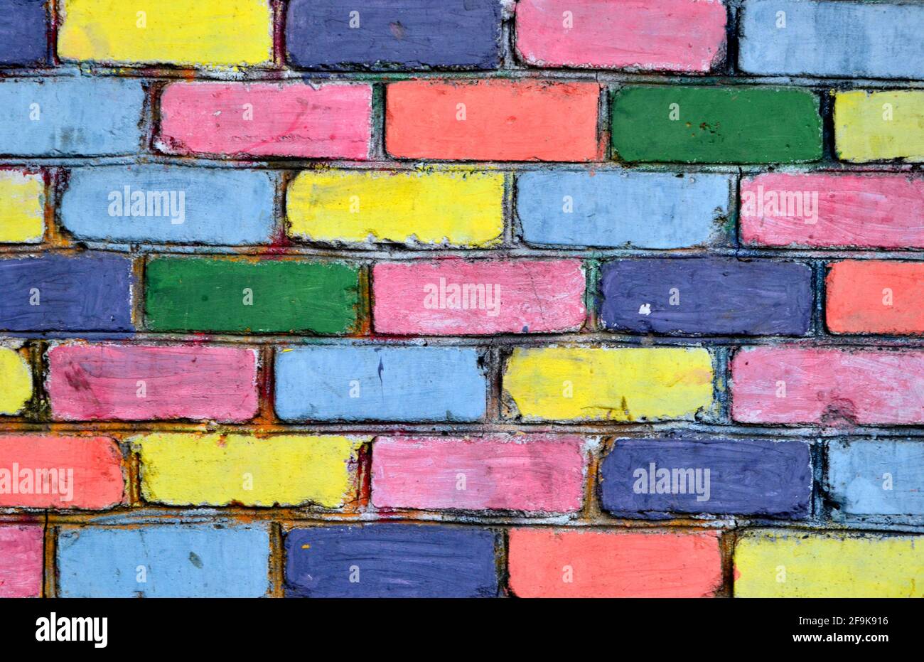 Rainbow colourful brick wall background. Colored wall stones Stock ...