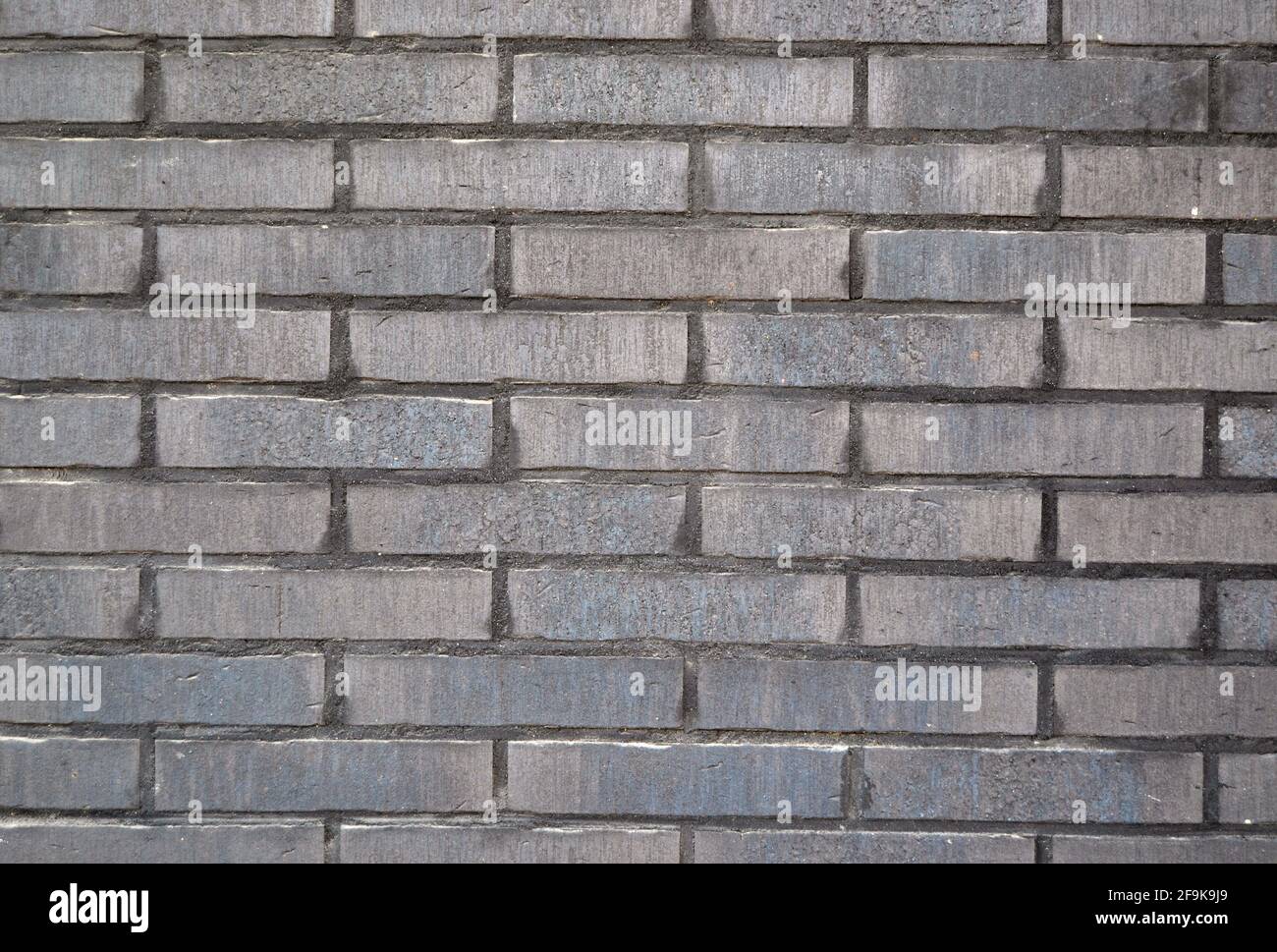 Dark grey brick wall texture. Abstract background or backdrop Stock ...