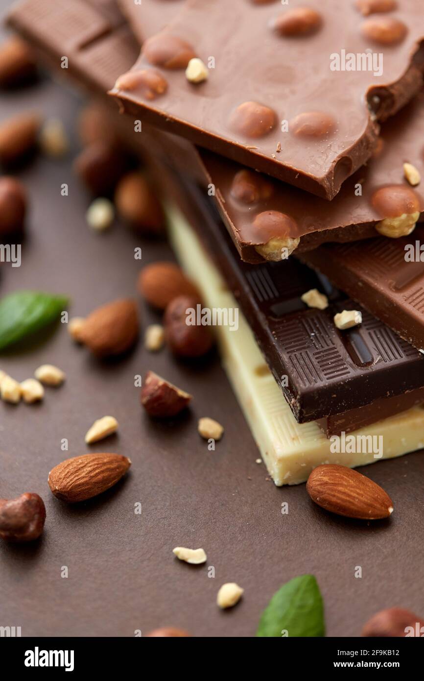 close up of different chocolate bars and nuts Stock Photo - Alamy