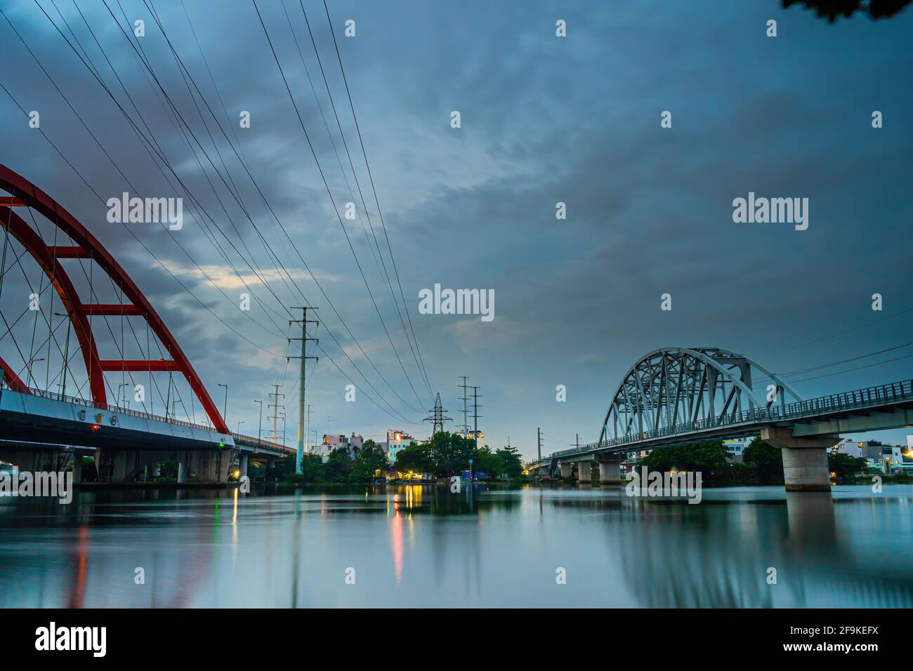 Beautiful sunset on Binh Loi Bridge new and old by night in the rush ...