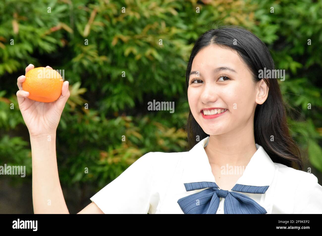 Smiling Beautiful Diverse Female Wearing Bowtie With Food Stock Photo ... Smiling Beautiful Diverse Female Wearing Bowtie With Food Stock Photo ...
