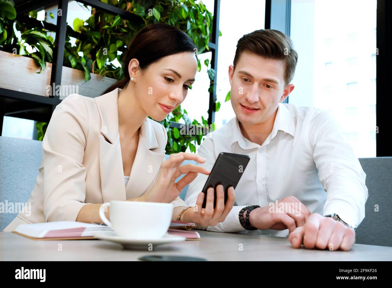 Colleagues discuss at the business meeting. Business people at work ...