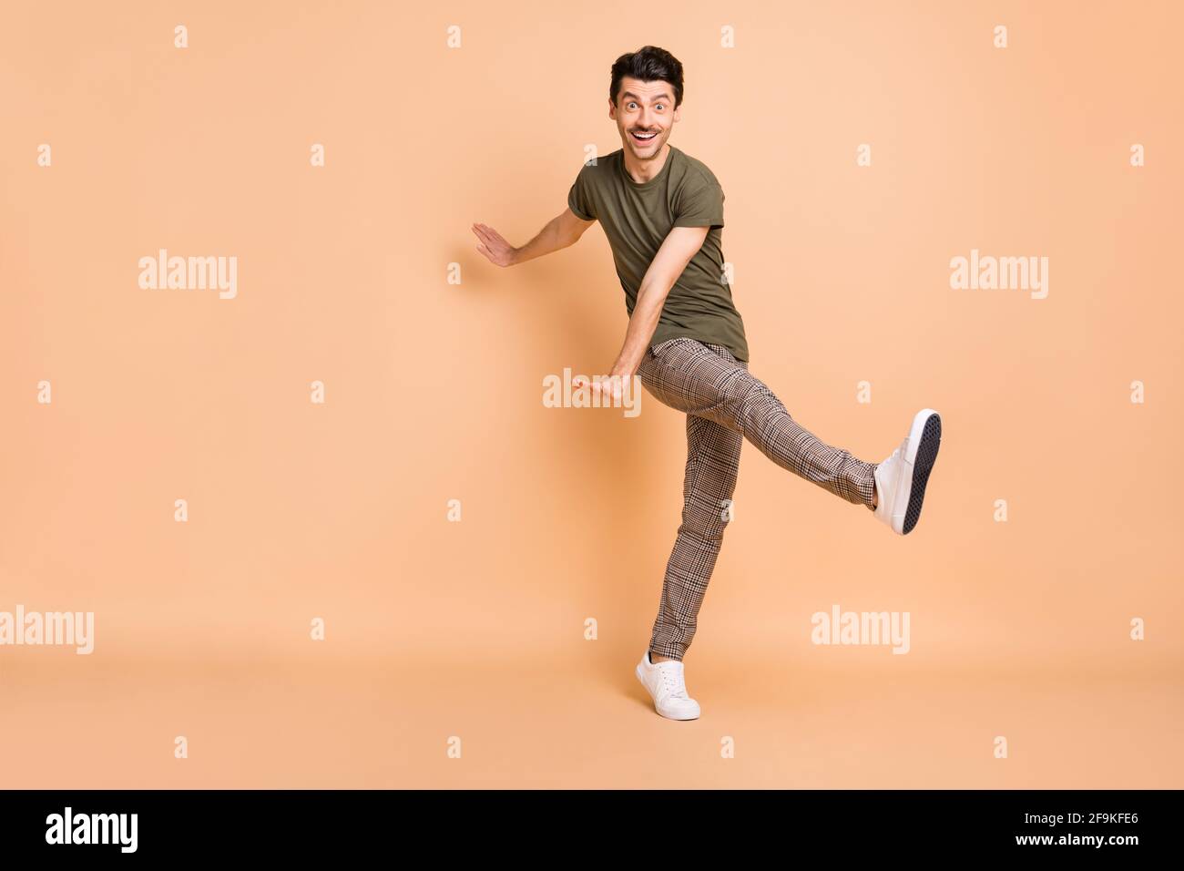 Full length body size photo of dancing guy spending free time wearing ...