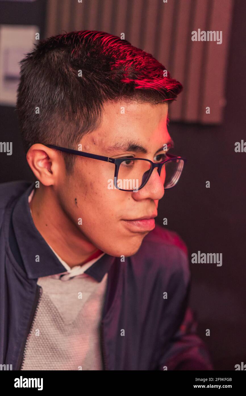 Young man concentrating on different activities that he must do to ...