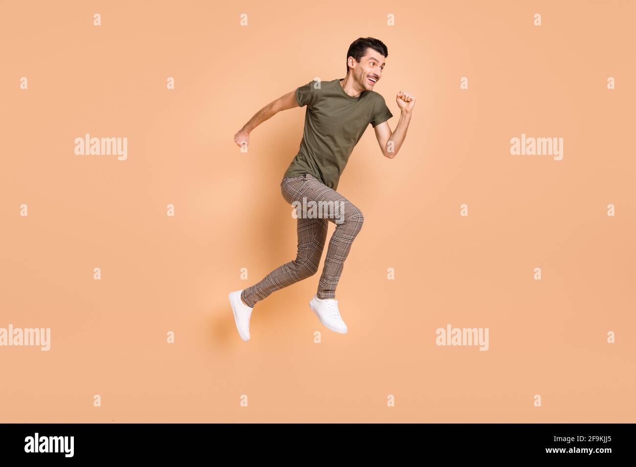 Full size profile side photo of young happy cheerful excited man ...