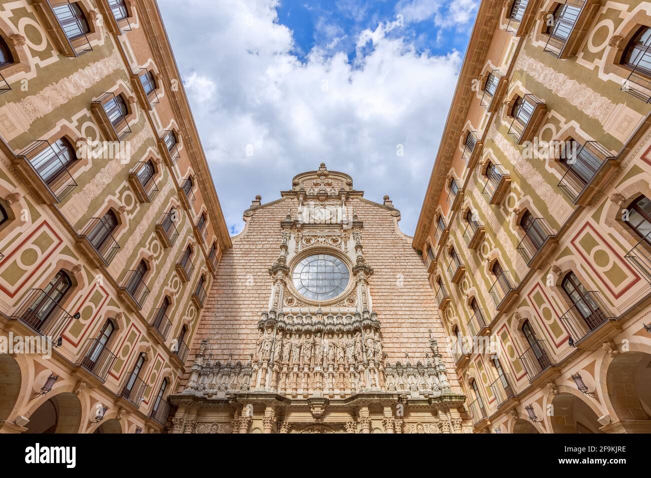 The facade of the Basilica in the Benedictine Abbey of Montserrat ...