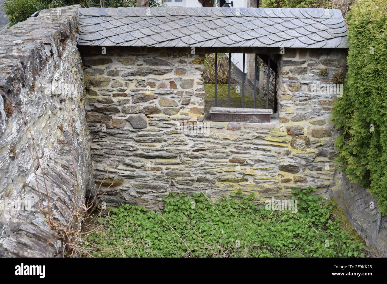 medieval wall with bars Stock Photo - Alamy