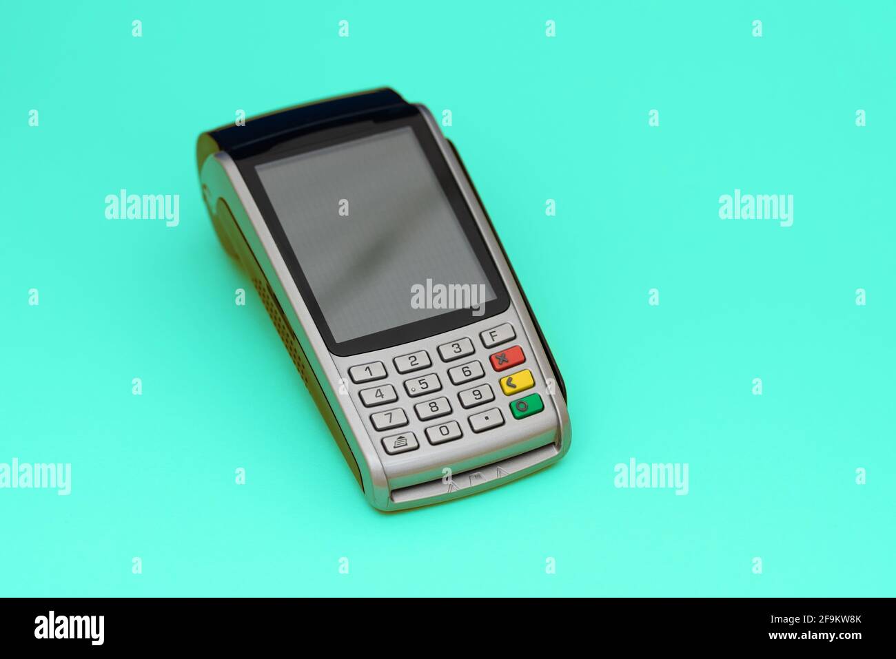 Electronic payment with green background Stock Photo - Alamy