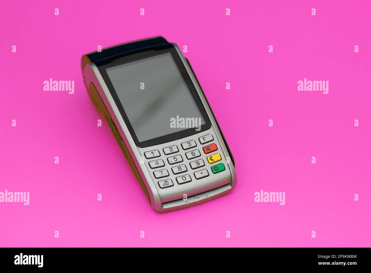 Electronic payment with pink background Stock Photo - Alamy