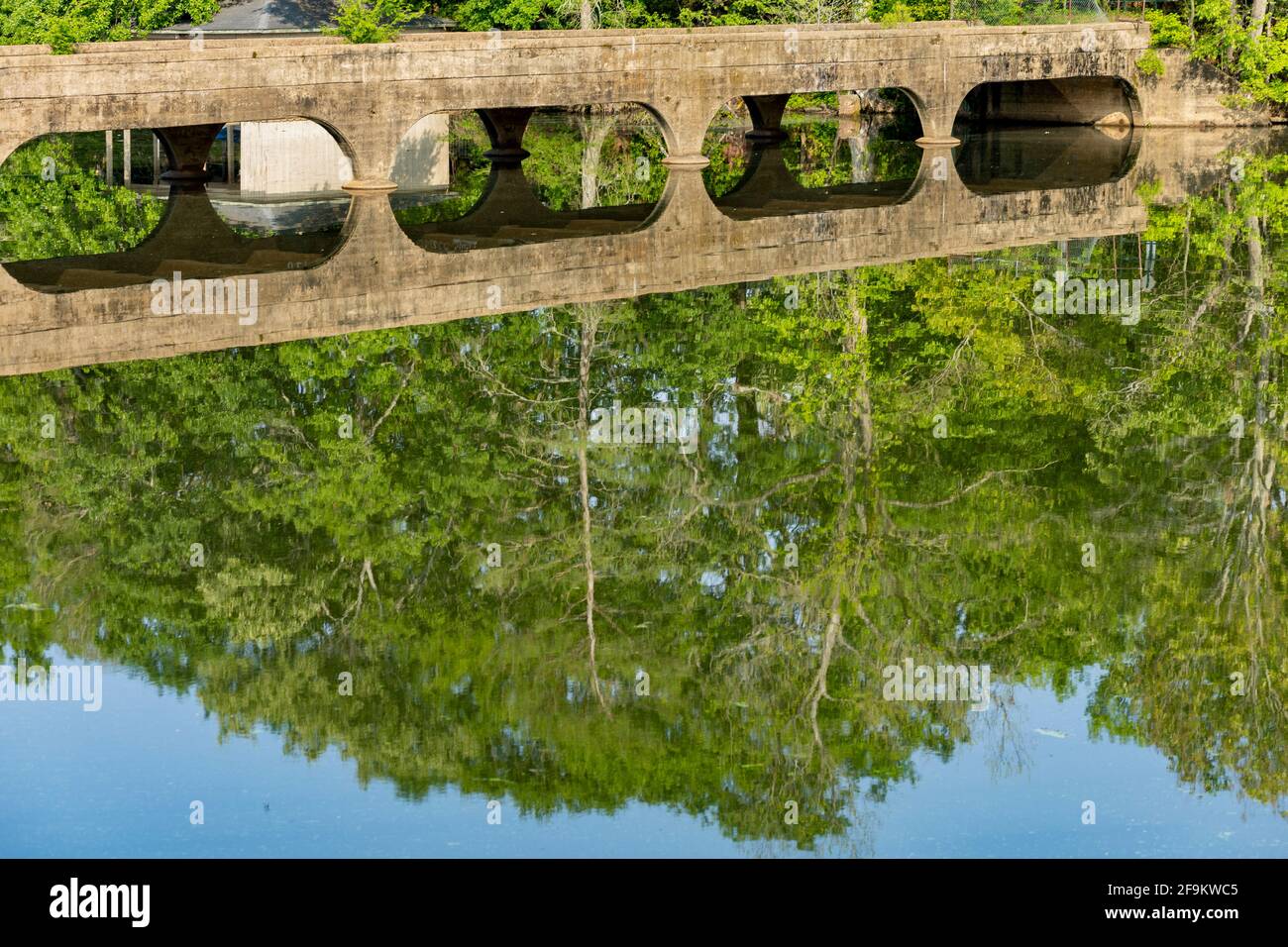 Reflections of Deborah Drive a closed pedestrian bridge over Bayou ...